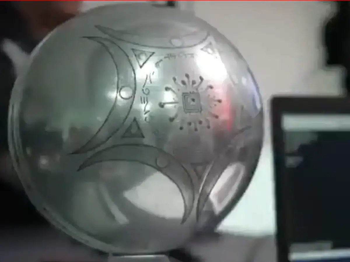 UFO Buga sphere has wires; 'invisible energy' dried up grass around it ...