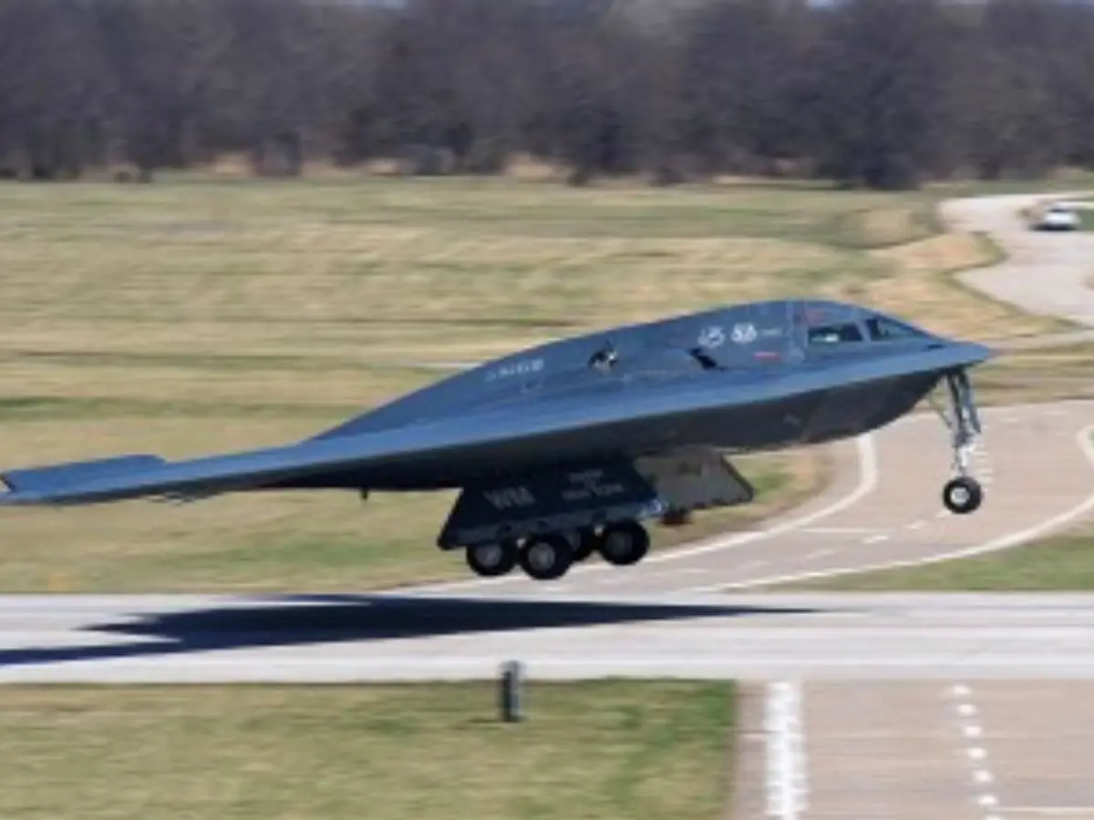 How many crew members fly the B-2 bomber?