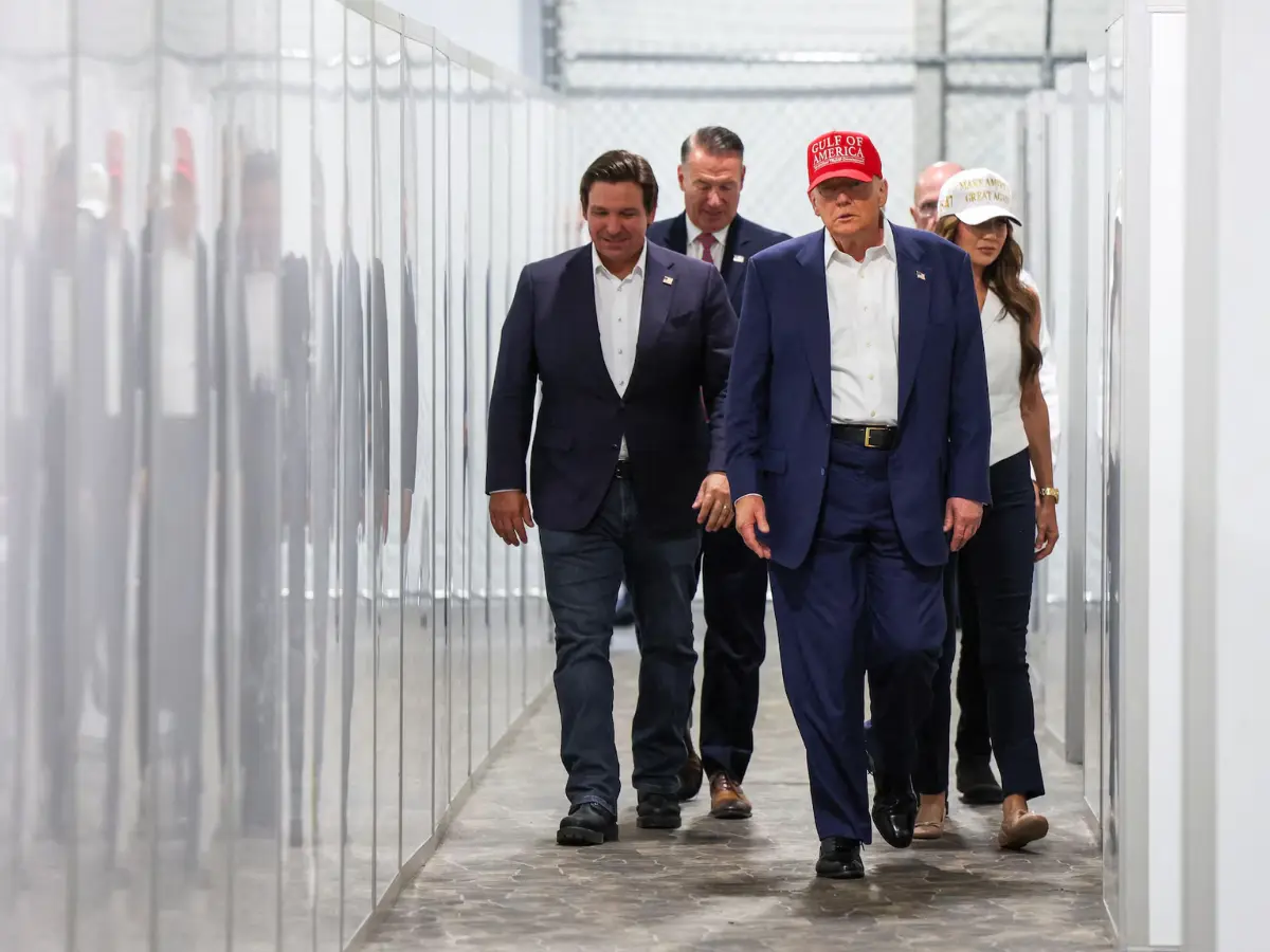 Trump tours 'Alligator Alcatraz' detention centre: Bunk beds, fenced-in ...