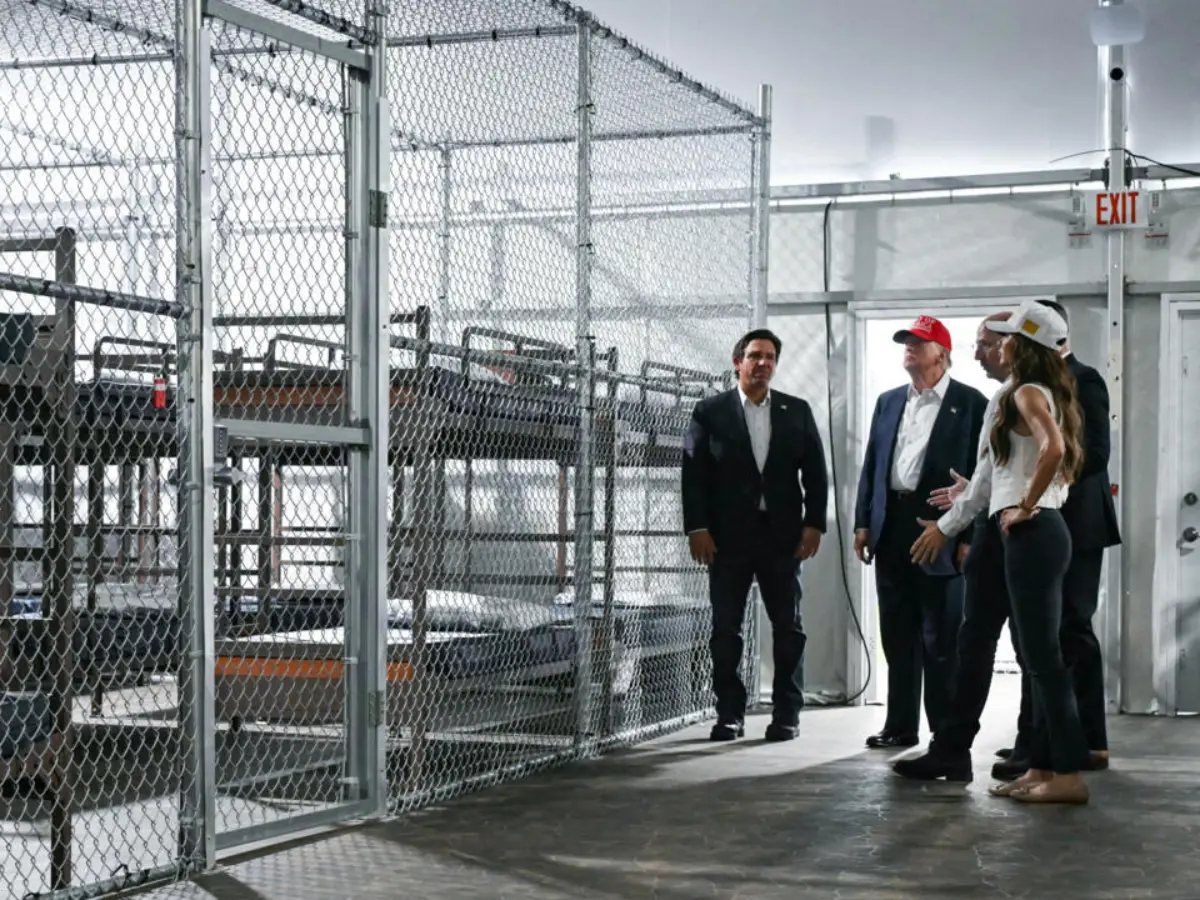 Trump tours 'Alligator Alcatraz' detention centre: Bunk beds, fenced-in ...