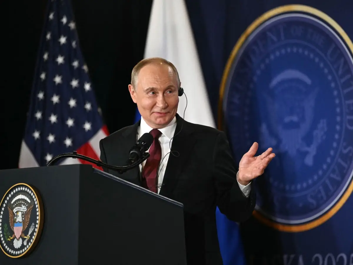 Putin speaks Russian, German AND English - still uses translator in ...