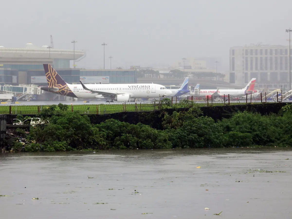 Mumbai monsoon: Over 250 flights delayed as heavy rains disrupt airport ...