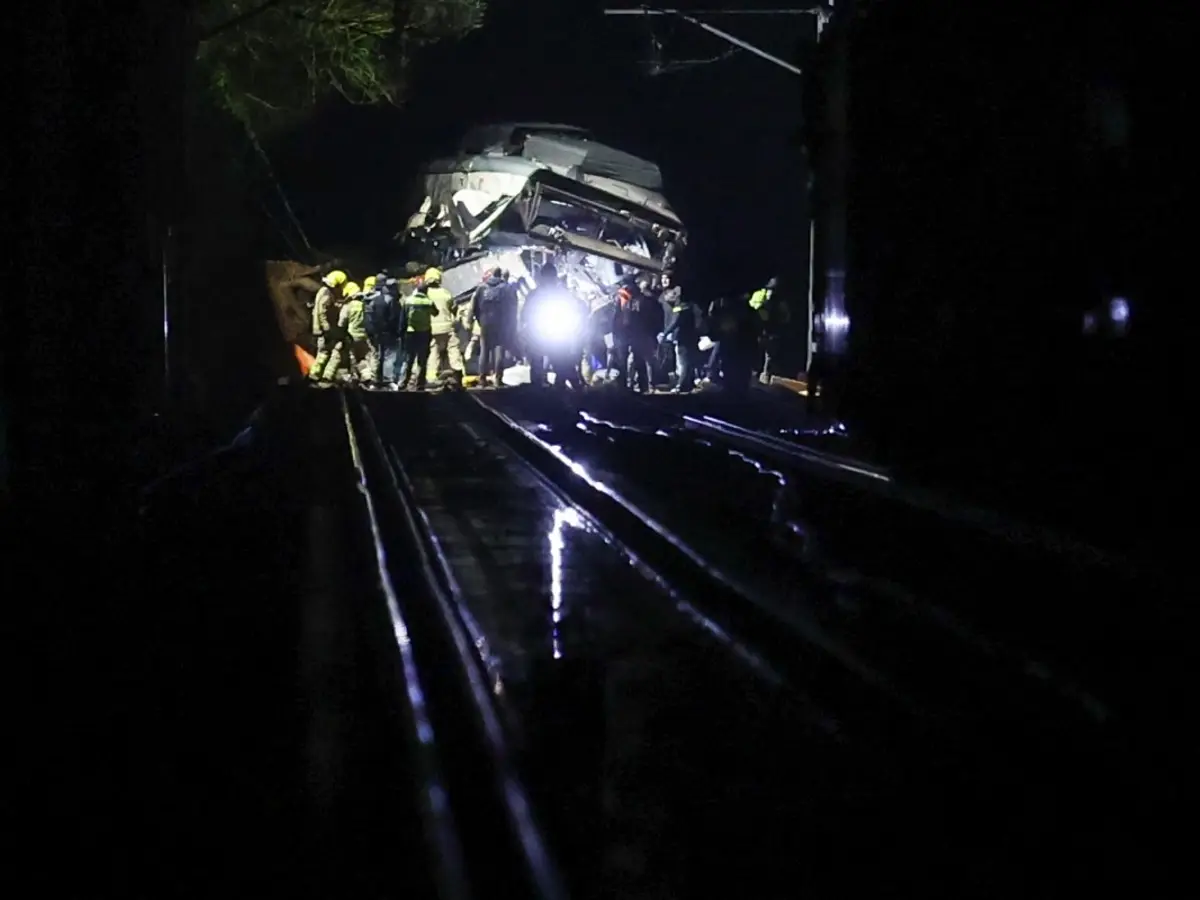 Train derails near Barcelona after hitting collapsed wall; driver ...