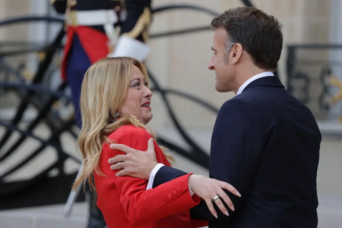 WATCH | Awkward! Macron-Meloni hug goes viral during high-stakes talks ...