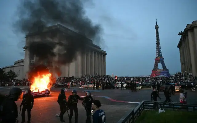 Violence erupts as PSG celebrates Champions League win against Arsenal