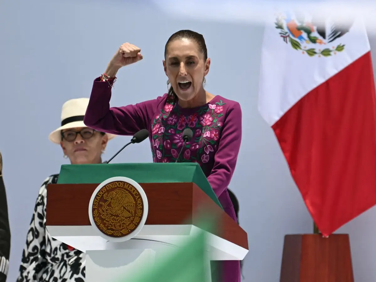 Mexico's president Claudia Sheinbaum tosses football during press ...