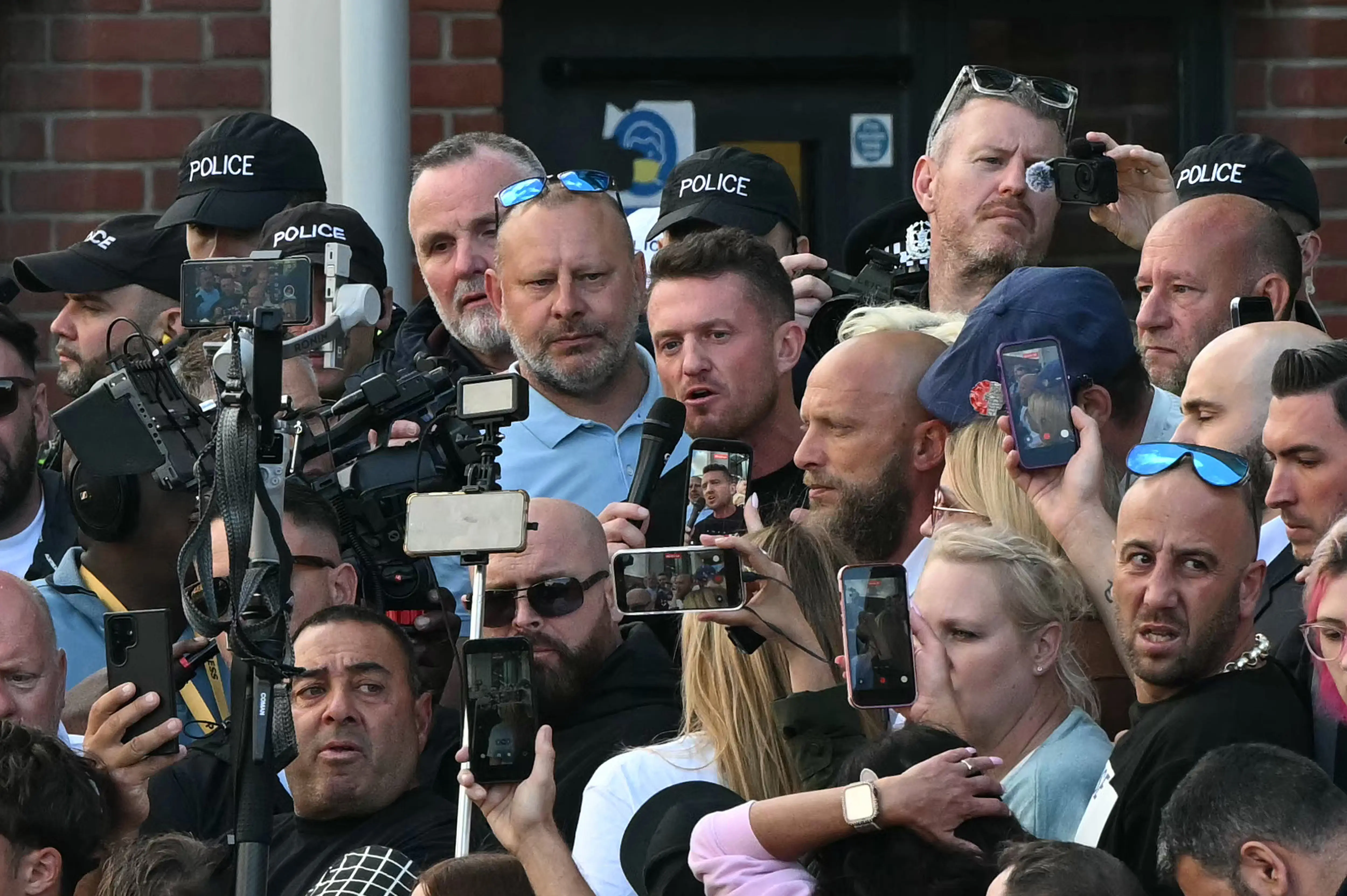 Far-right activist Tommy Robinson detained at Heathrow Airport under ...